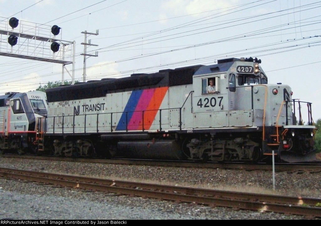 Train engineer drives GP40PH-2B on the NJCL